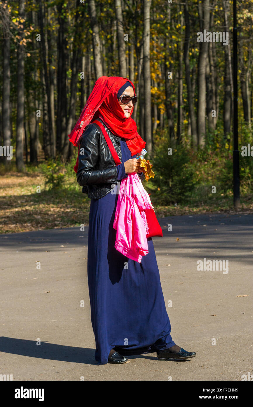 23/09 Woman wearing bright Muslim clothes and a Red Hijab headscarf ...