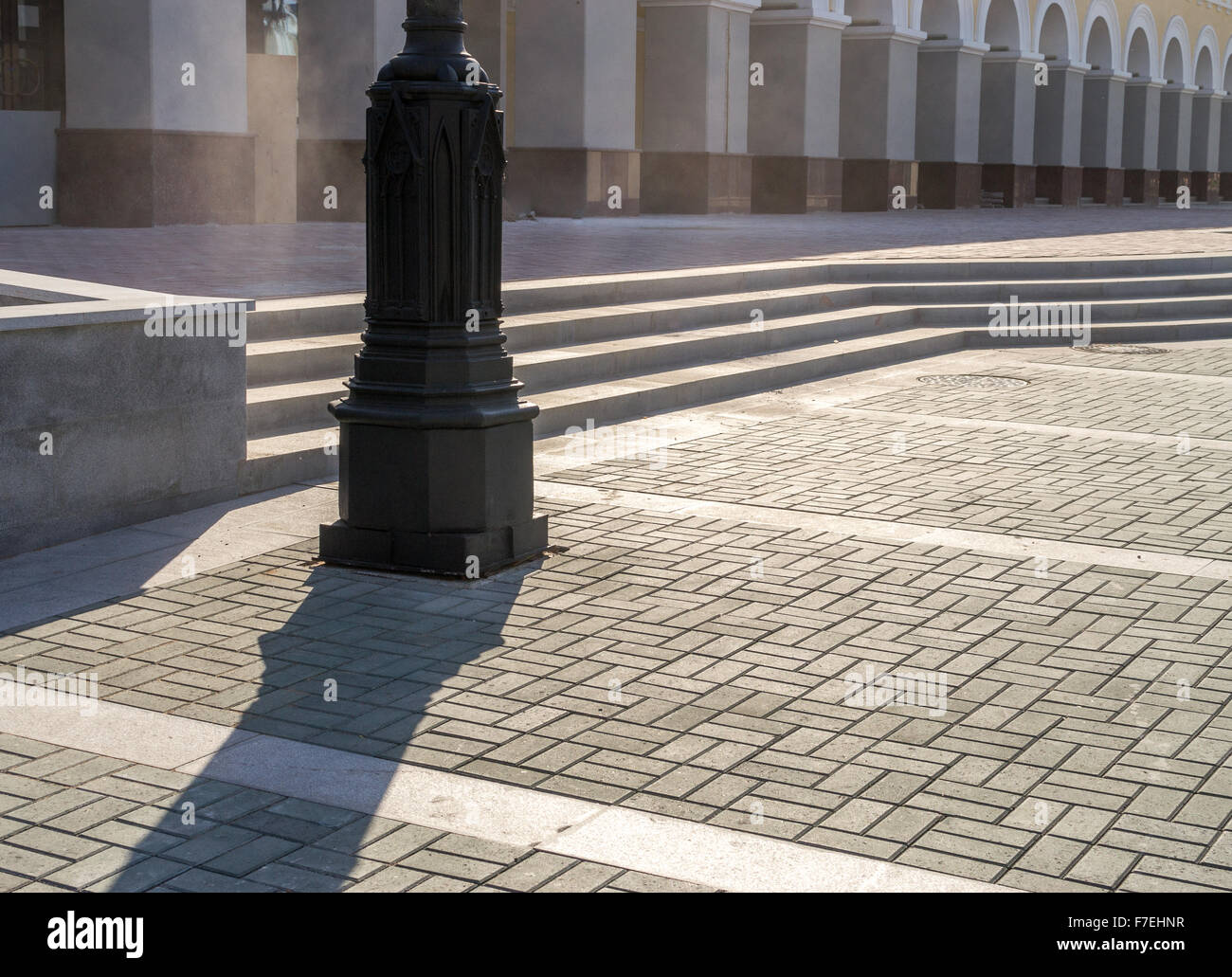 Single black cast iron lam post in black and white with expressionist ...