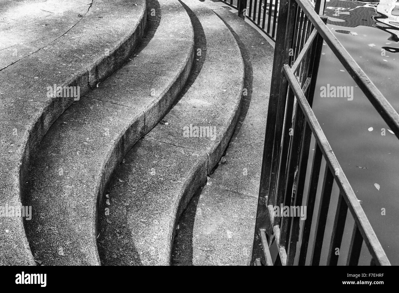 Solid concrete swirls and metal railings abstract Stock Photo - Alamy
