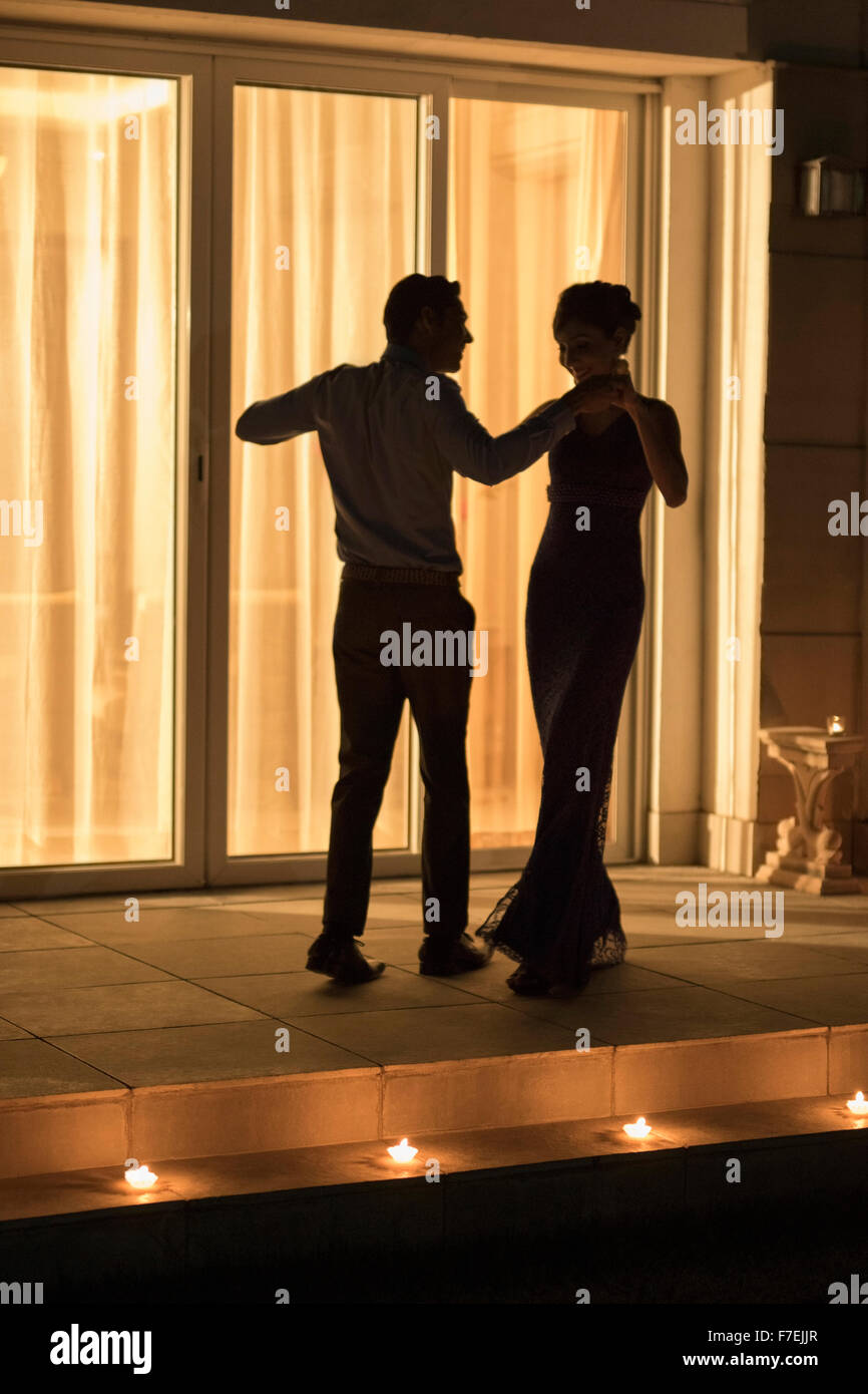 Man outside house night hi-res stock photography and images - Alamy