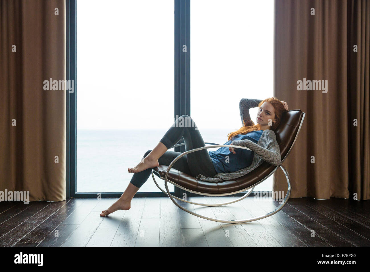 Woman rocking chair hi-res stock photography and images - Alamy