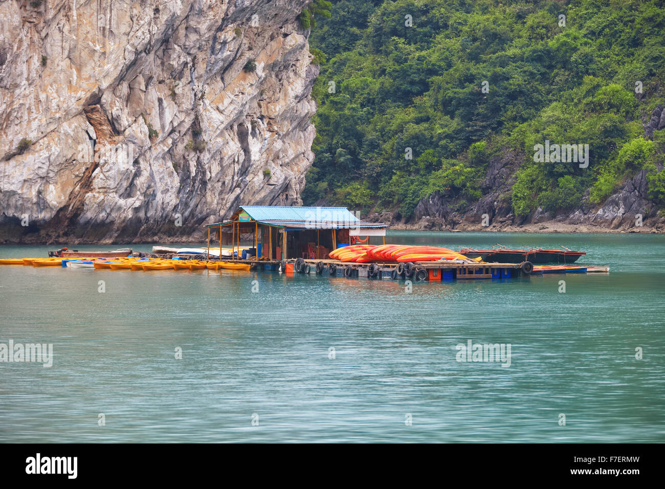 Asian floating village at Halong Bay Stock Photo - Alamy