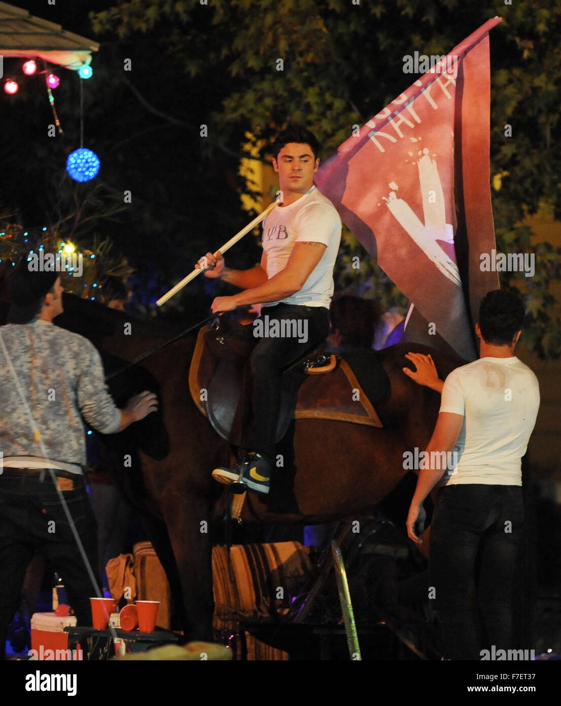 Zac Efron puts on his saddle for a scene in 'Neighbors 2' filming in ...