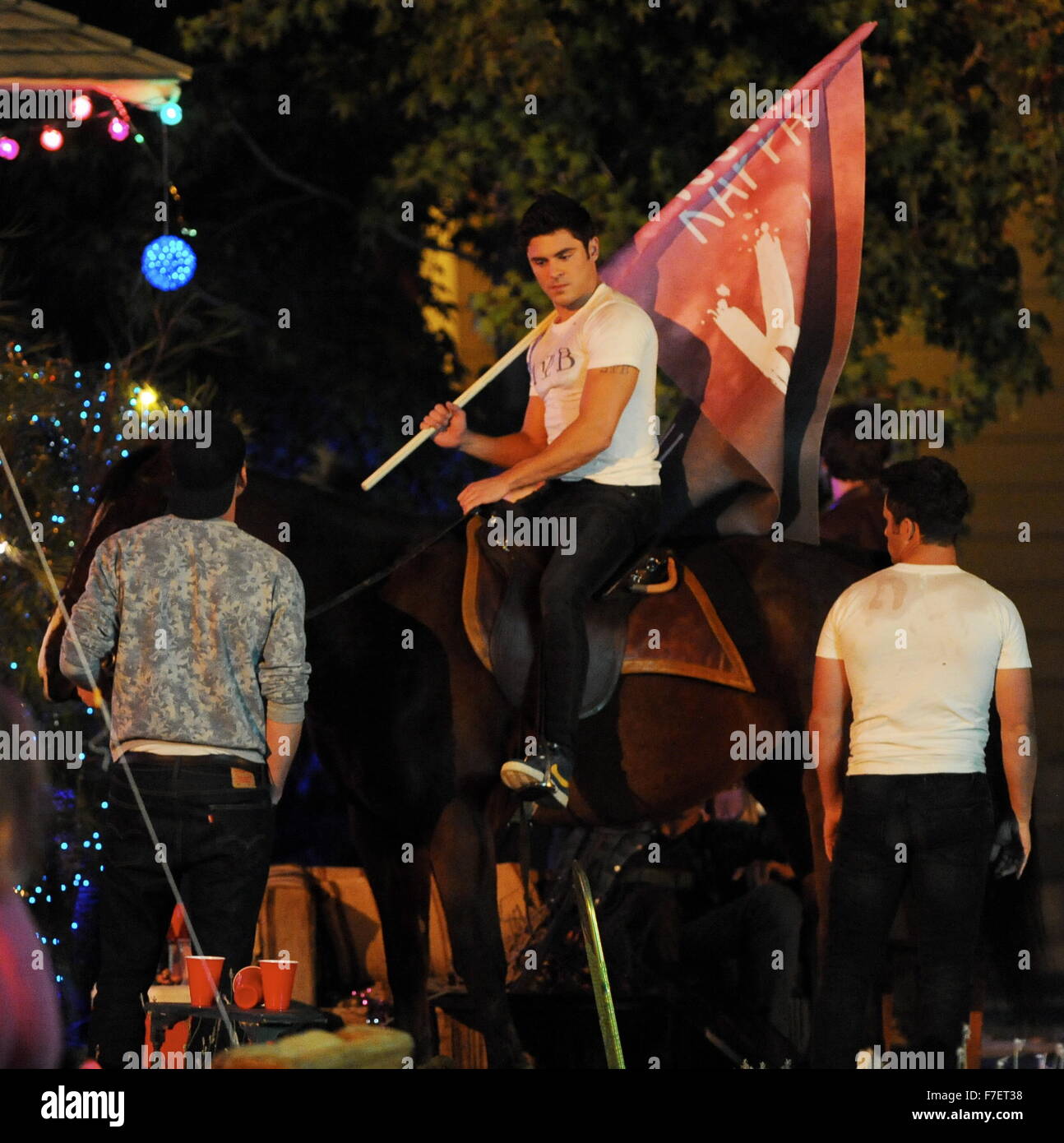 Zac Efron puts on his saddle for a scene in 'Neighbors 2' filming in ...