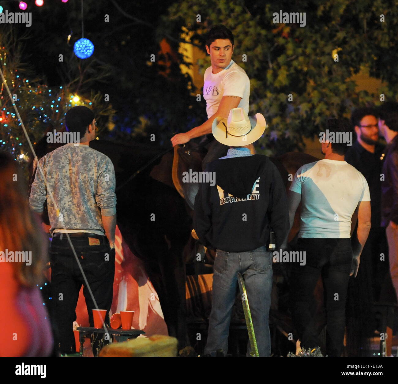 Zac Efron puts on his saddle for a scene in 'Neighbors 2' filming in ...