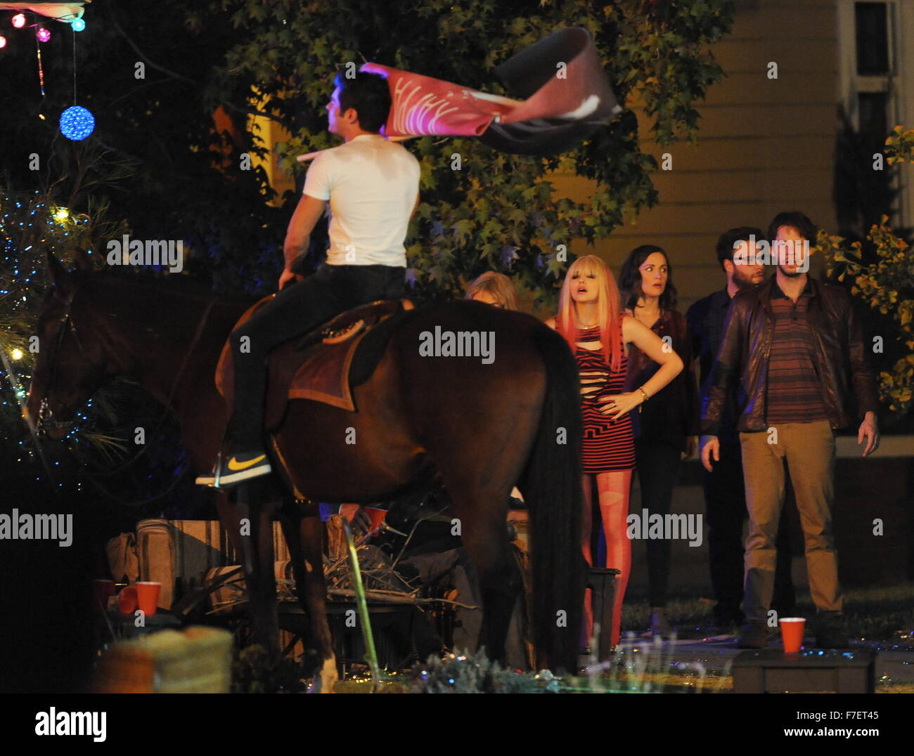 Zac Efron puts on his saddle for a scene in 'Neighbors 2' filming in ...