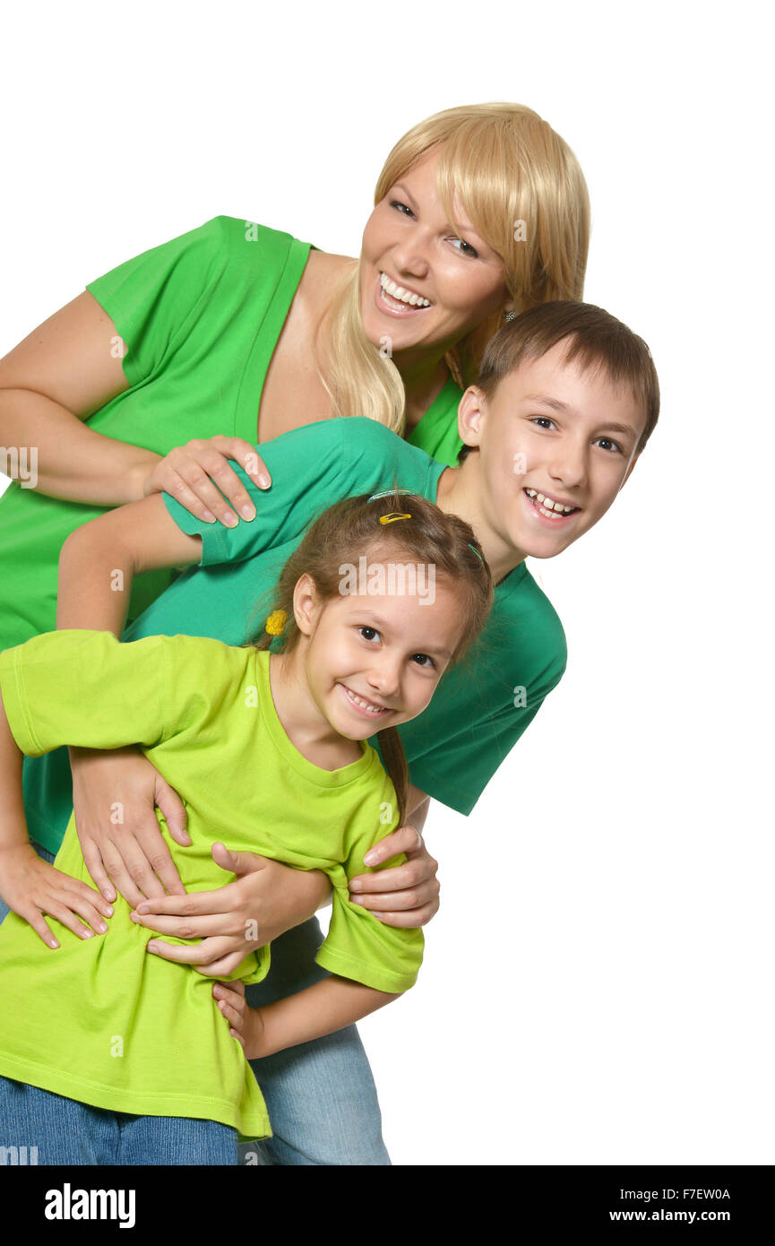 Happy family of four standing on white background Stock Photo - Alamy