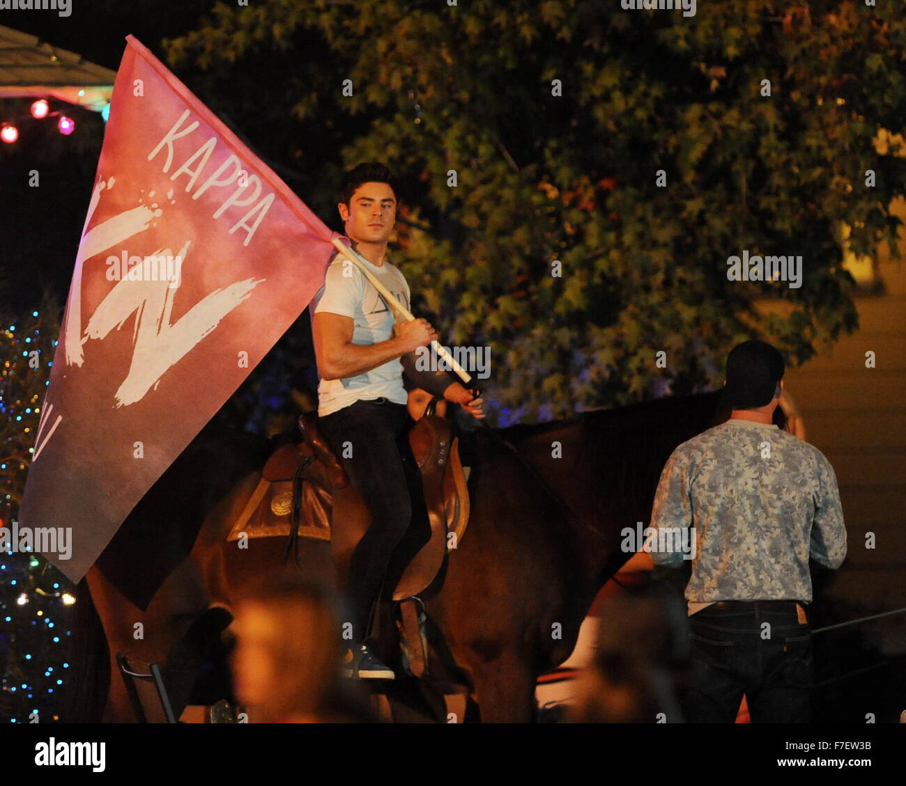 Zac Efron puts on his saddle for a scene in 'Neighbors 2' filming in ...