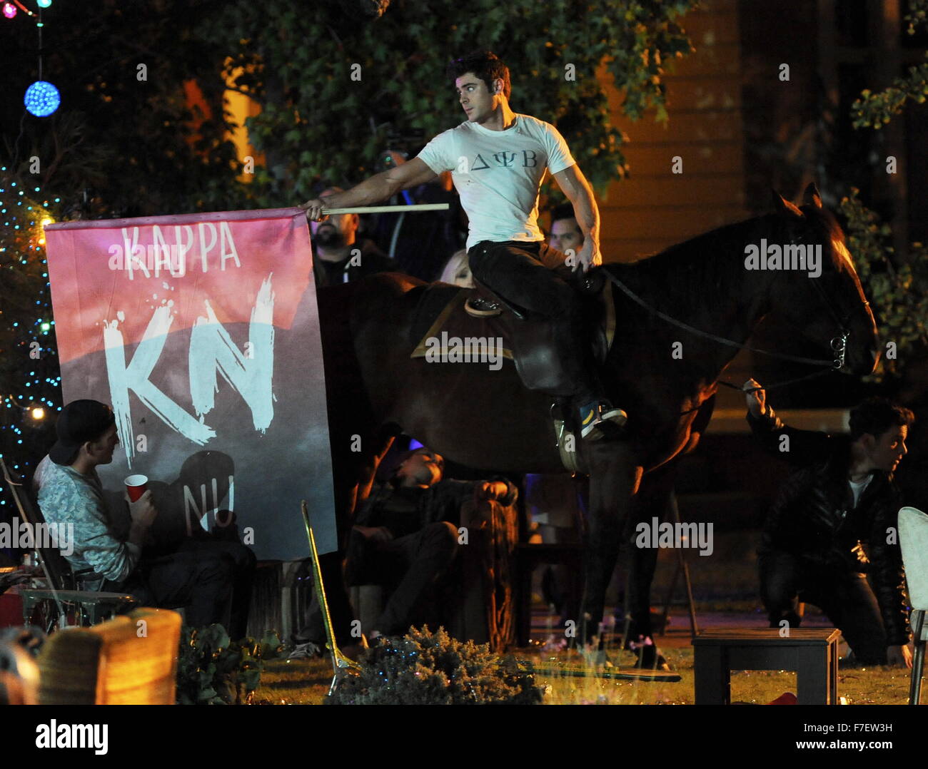 Zac Efron puts on his saddle for a scene in 'Neighbors 2' filming in ...