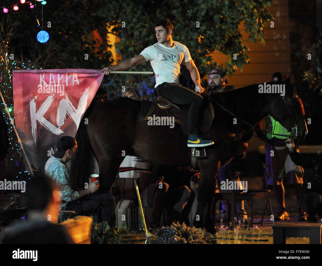 Zac Efron puts on his saddle for a scene in 'Neighbors 2' filming in ...
