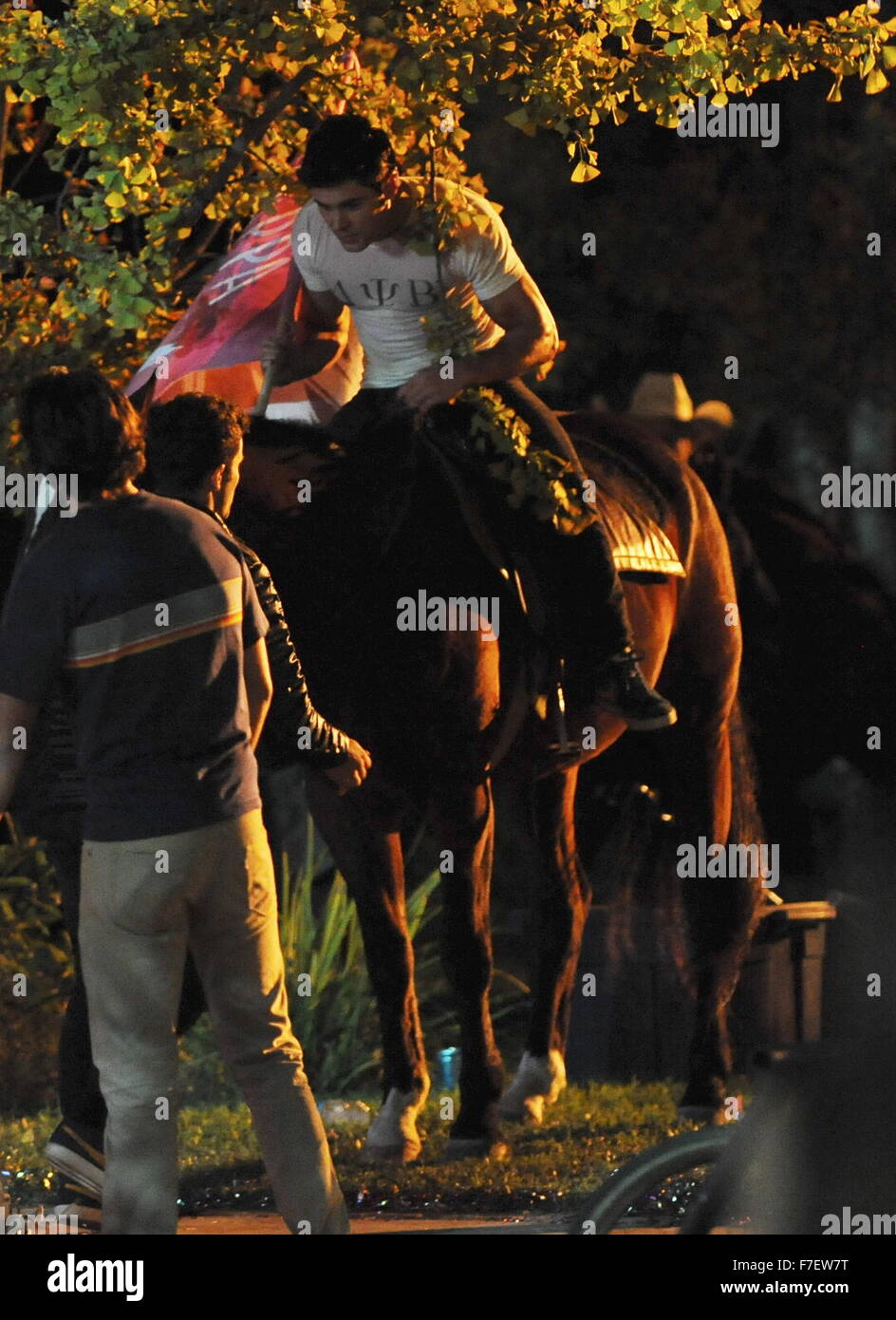Zac Efron puts on his saddle for a scene in 'Neighbors 2' filming in ...