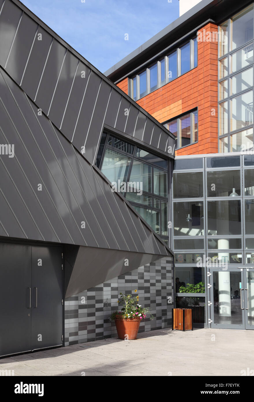 External view of the zinc-clad school auditorium building at Pimlico ...