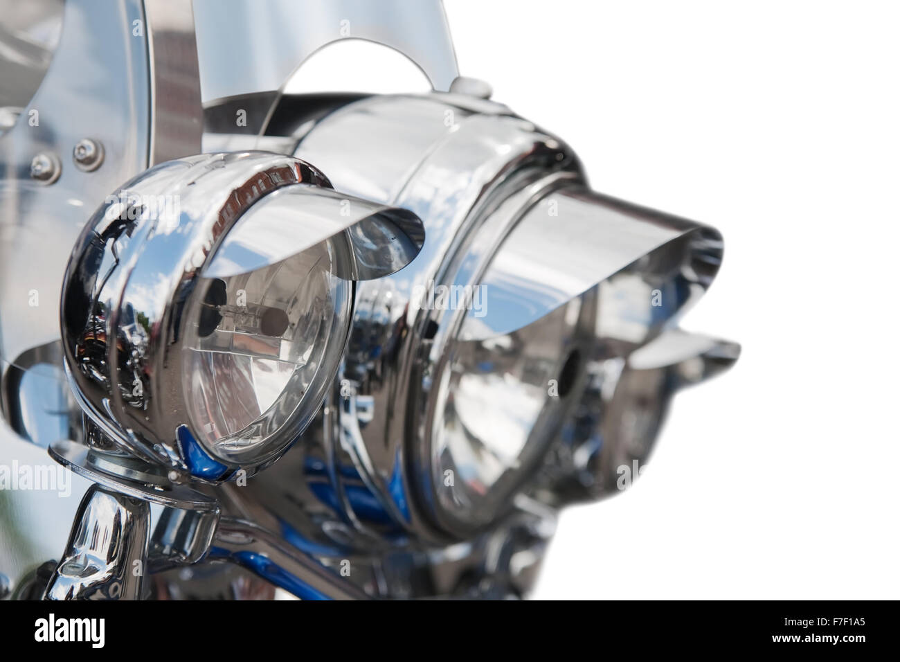 shiny headlight of big motorcycle. Isolated over white Stock Photo - Alamy