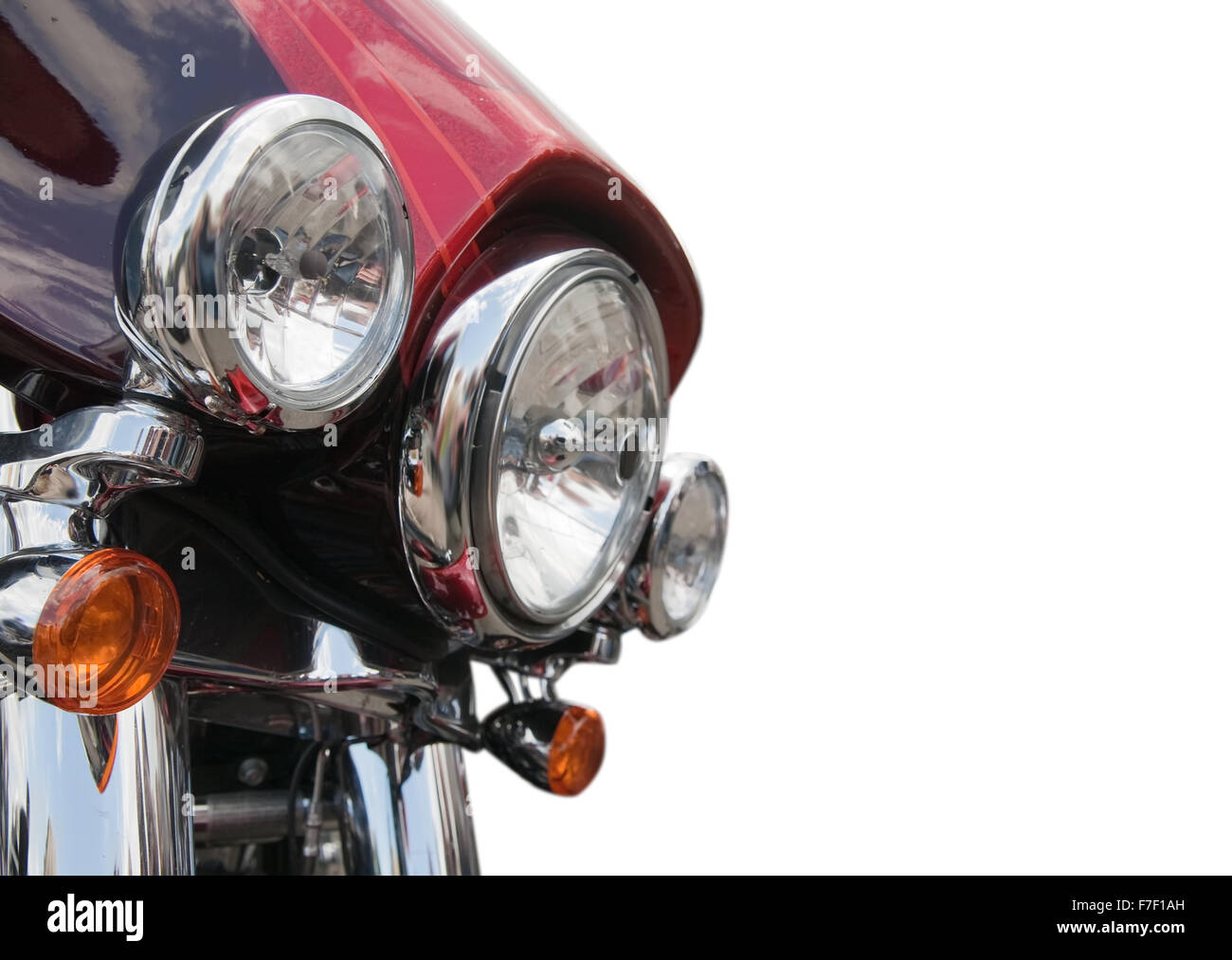 shiny headlight of big motorcycle. Isolated over white Stock Photo - Alamy