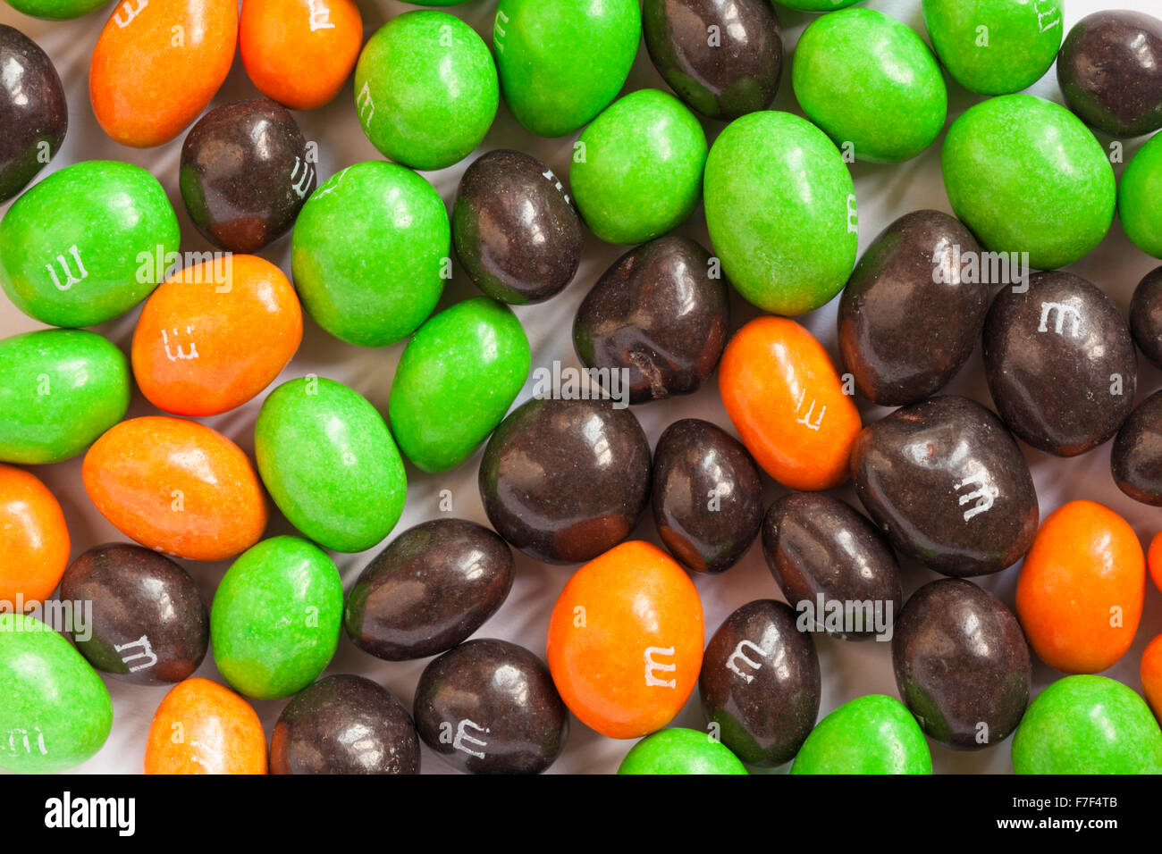 peanut M&Ms spooky colours for Halloween spread out Stock Photo - Alamy