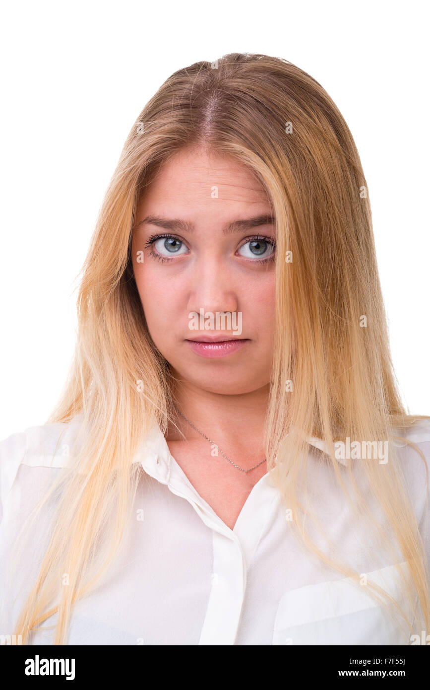 young woman looks skeptical, isolated on white studio shot Stock Photo ...
