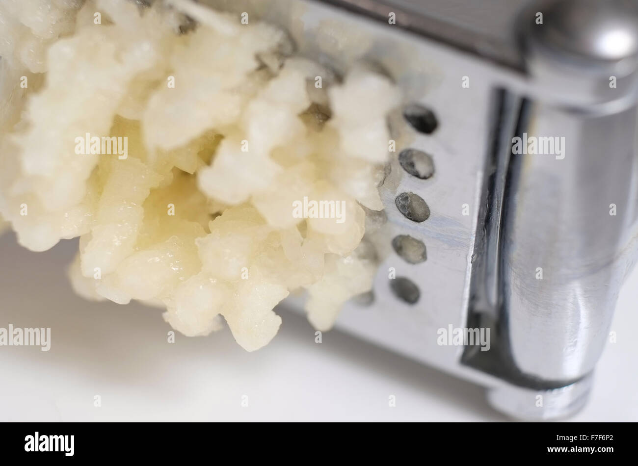 stainless steel garlic press Stock Photo - Alamy