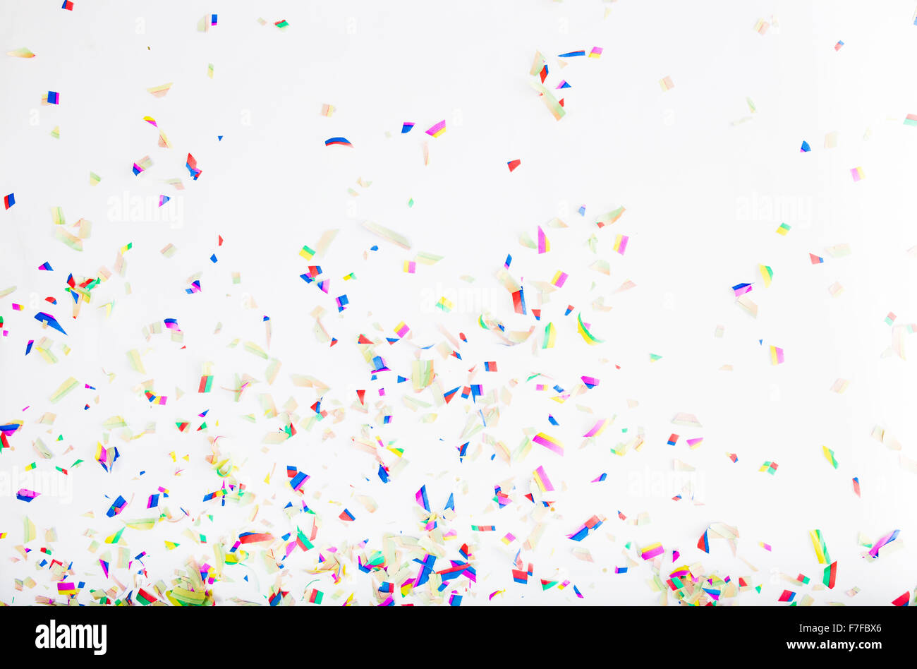 Colorful confetti on white background Stock Photo - Alamy