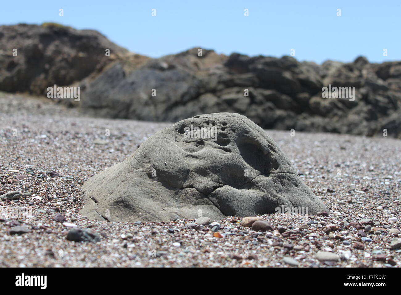 Rock sticking out of sand might bigger than it looks ! see how it is ...