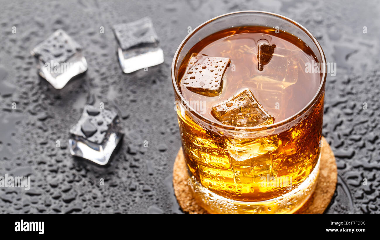 Glass with alcoholic drink Stock Photo - Alamy