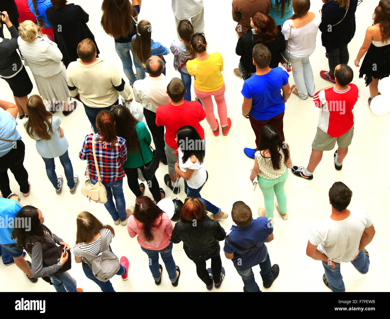 crowd of people standing back isolated on the white Stock Photo - Alamy
