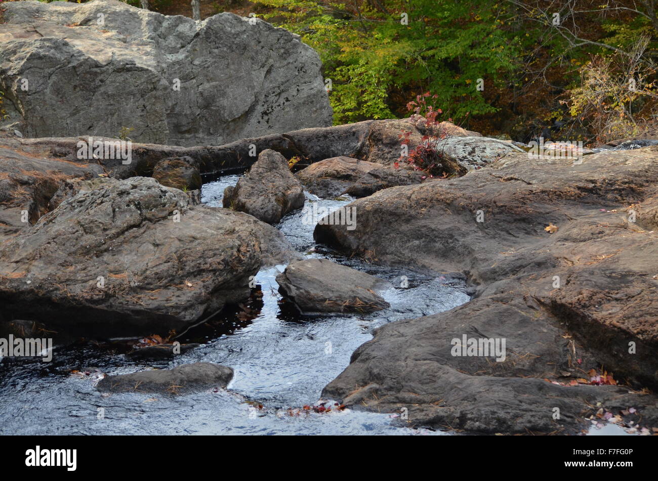 Water cascading through rocks hi-res stock photography and images - Alamy