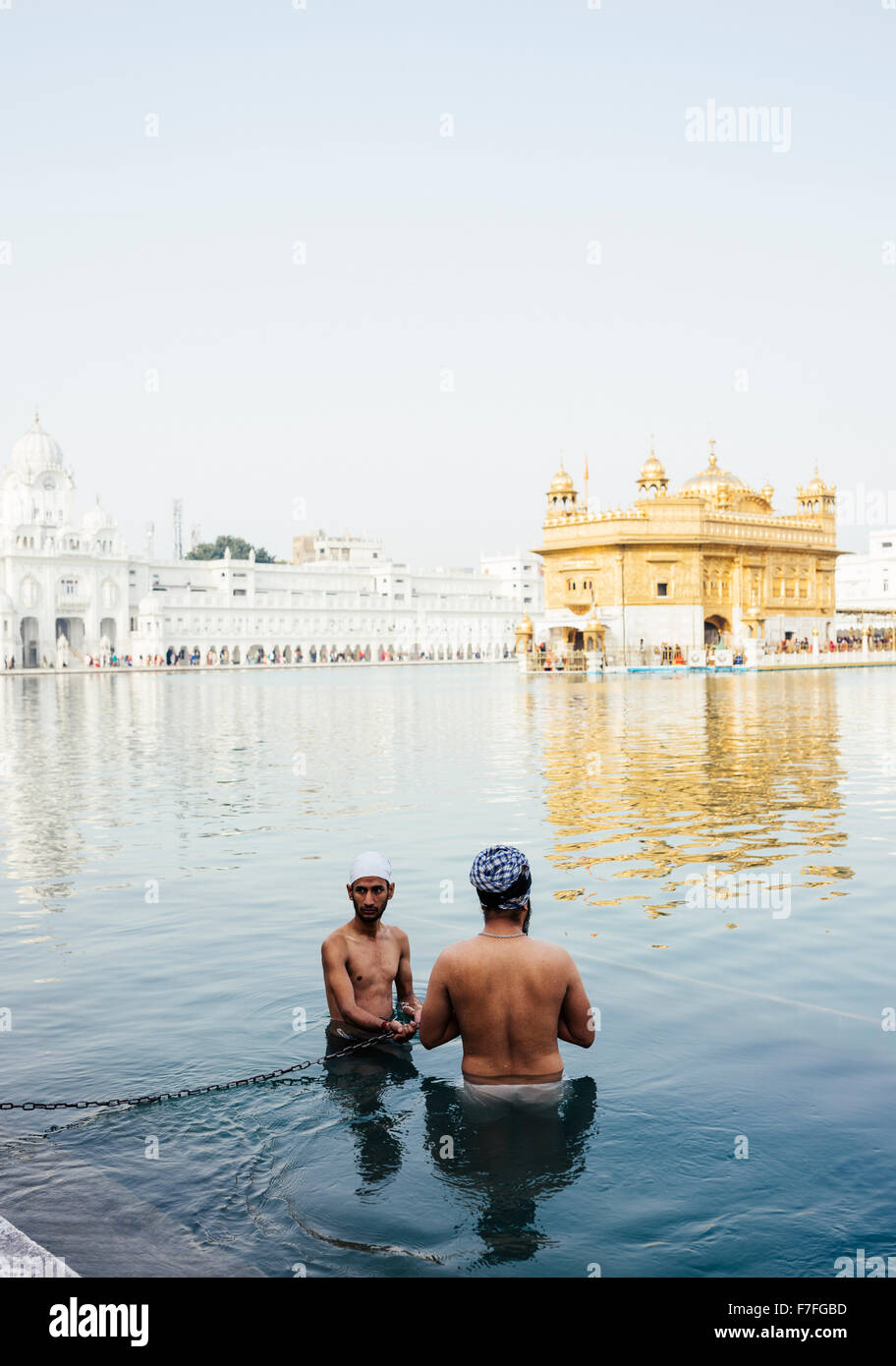Indian men bathing hi-res stock photography and images - Alamy