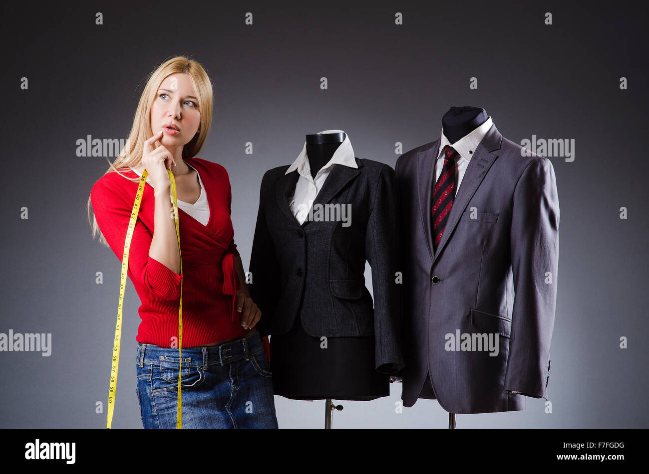 Woman tailor working on clothing Stock Photo - Alamy
