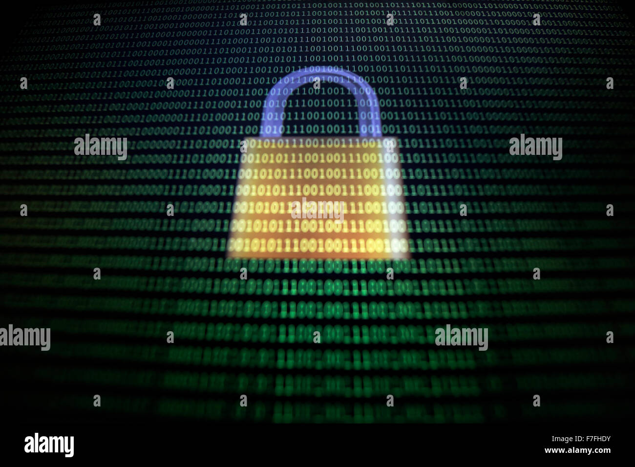 A lock is pictured on a computer screen with binary type Stock Photo ...