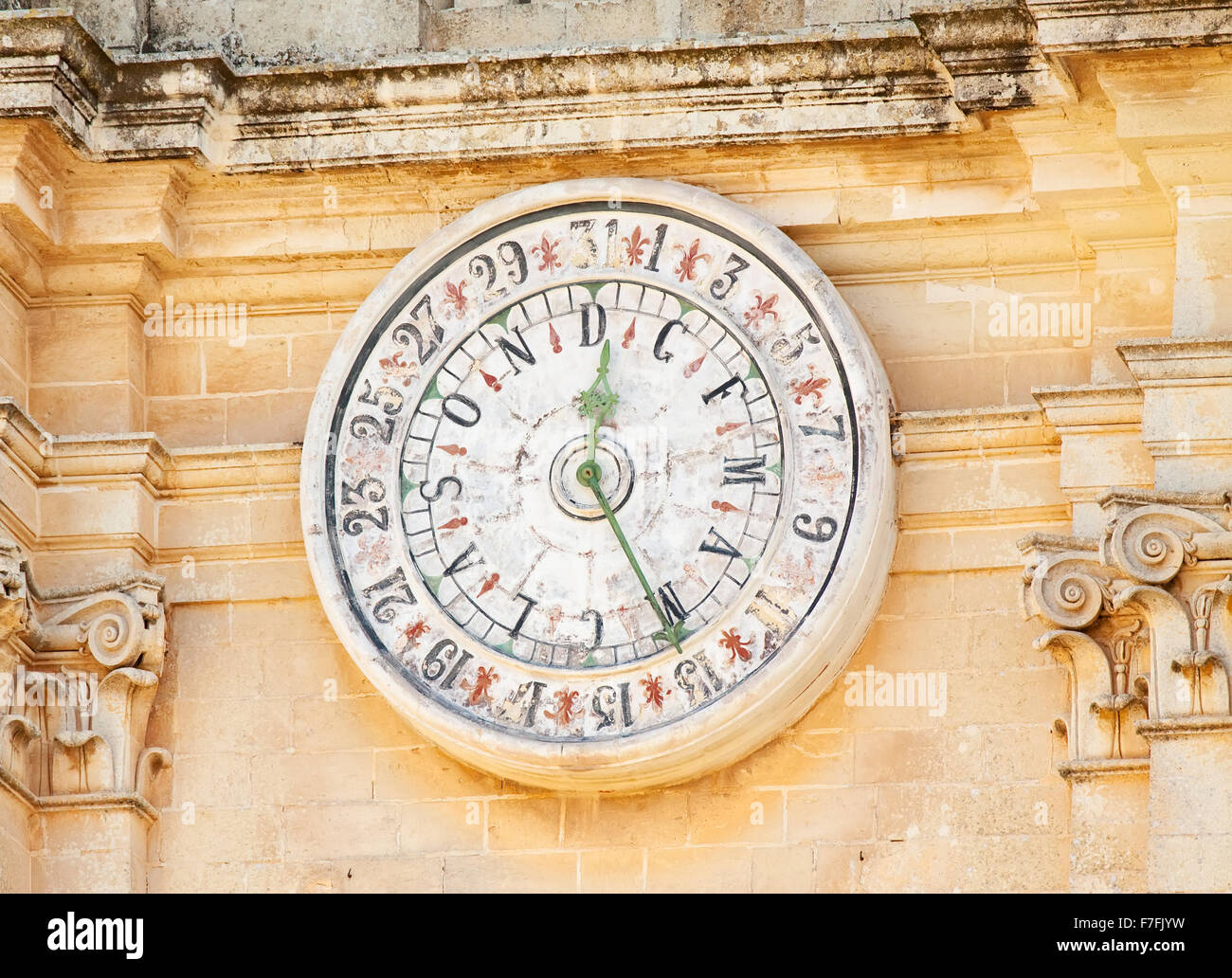Date Clock on facade of St. Peter & Paul Cathedral at Mdina. Malta ...