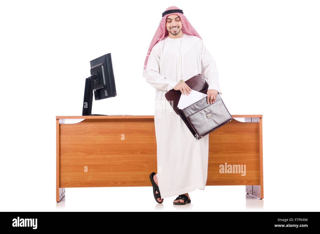 Arab man sitting at his desk Stock Photo - Alamy