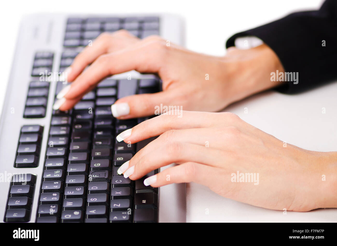 Hands working on the keyboard Stock Photo - Alamy