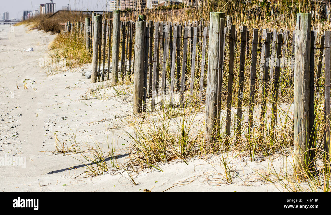 Fences Posts In A Row In The Sand At Myrtle Beach Stock Photo - Alamy