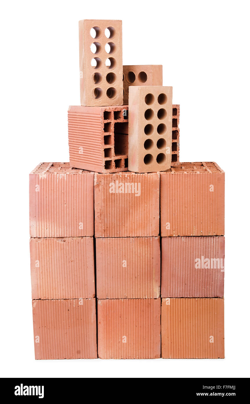 Stack of clay bricks isolated on white Stock Photo - Alamy