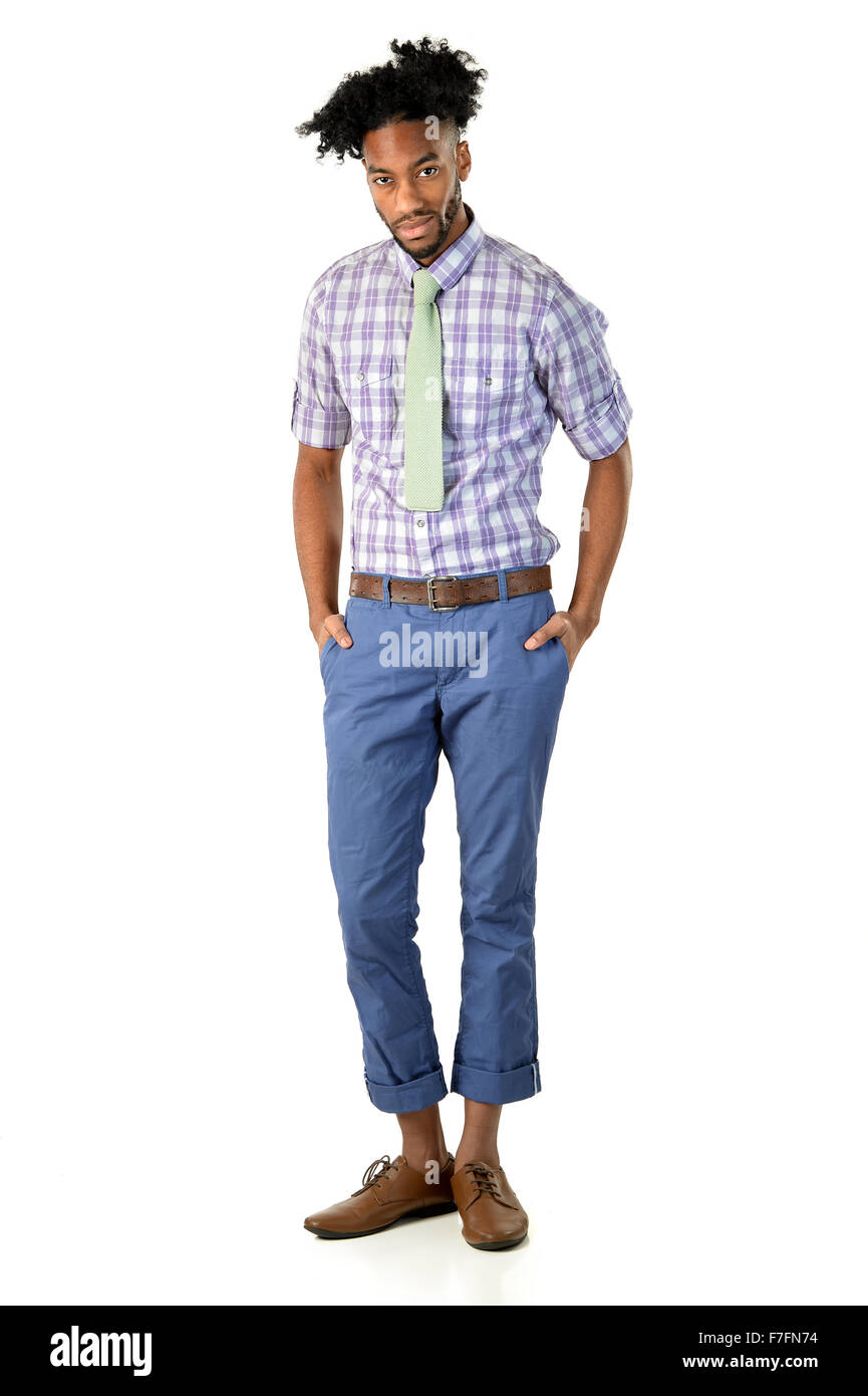 Portrait of African American man standing isolated over white ...