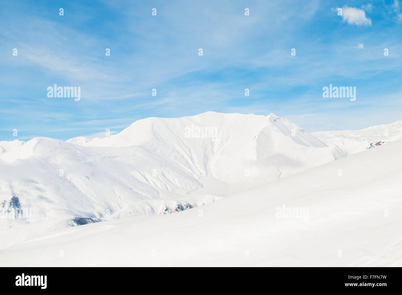Snow mountains on bright winter day Stock Photo - Alamy