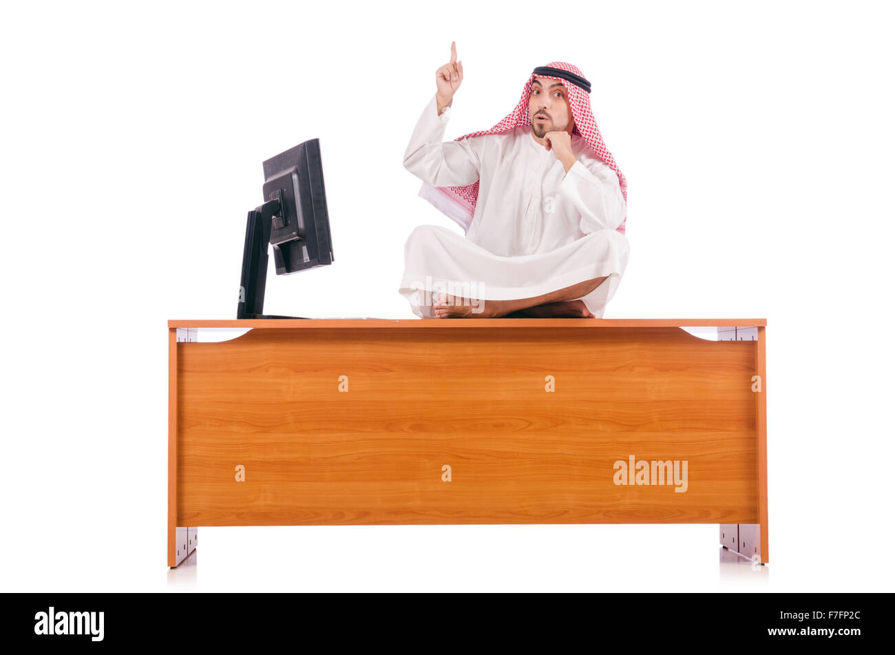 Arab man sitting at his desk Stock Photo - Alamy