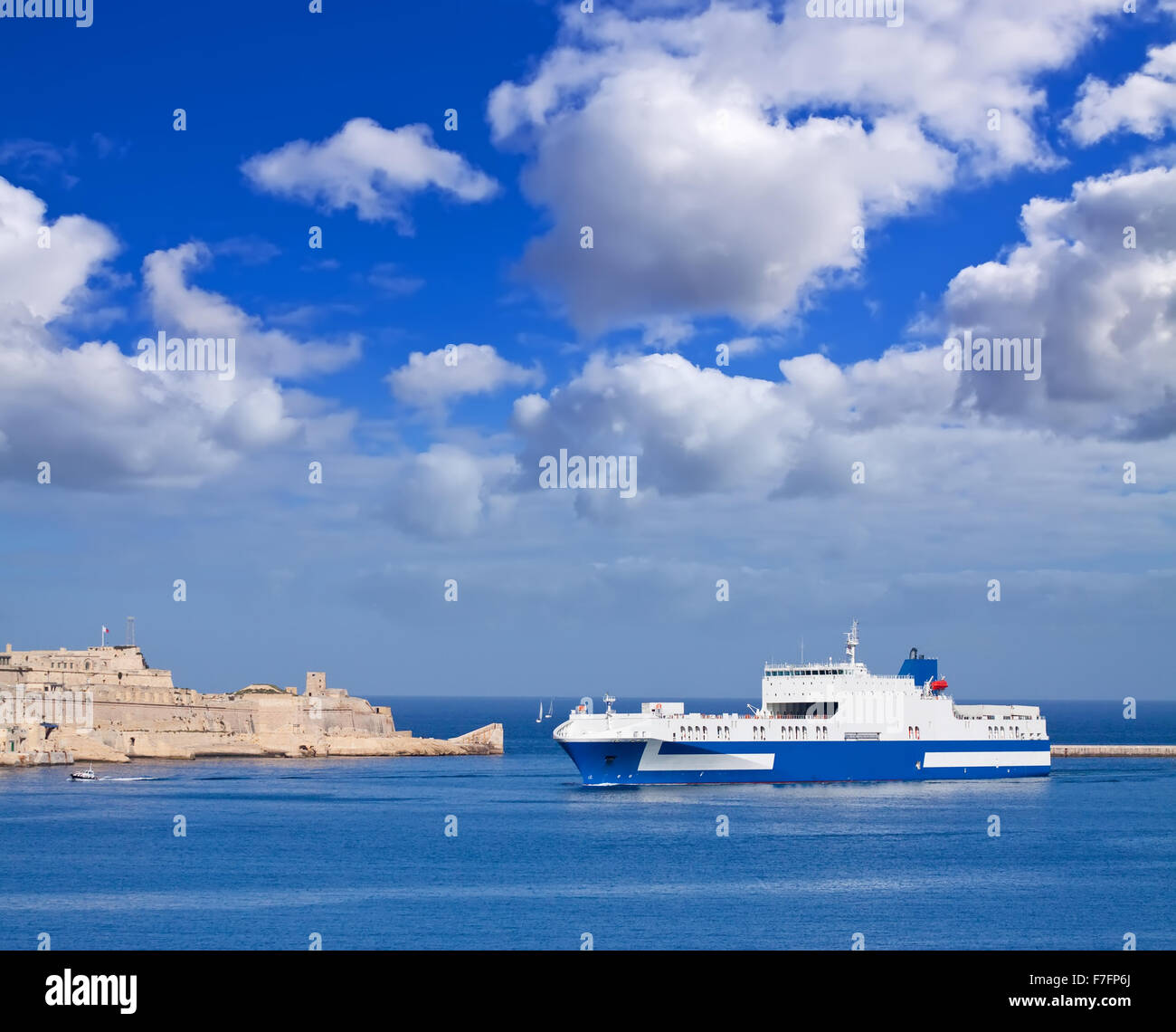 Cargo ship going in to Grand harbour (Valleta, Malta Stock Photo - Alamy