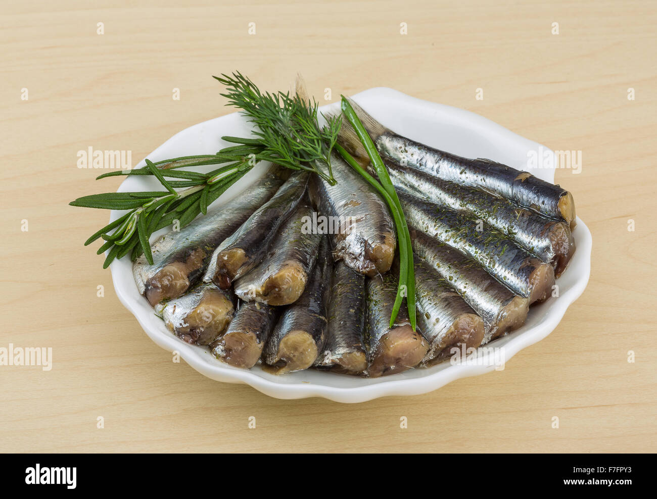 Salted anchovy with spices and herbs - ready for eat Stock Photo - Alamy