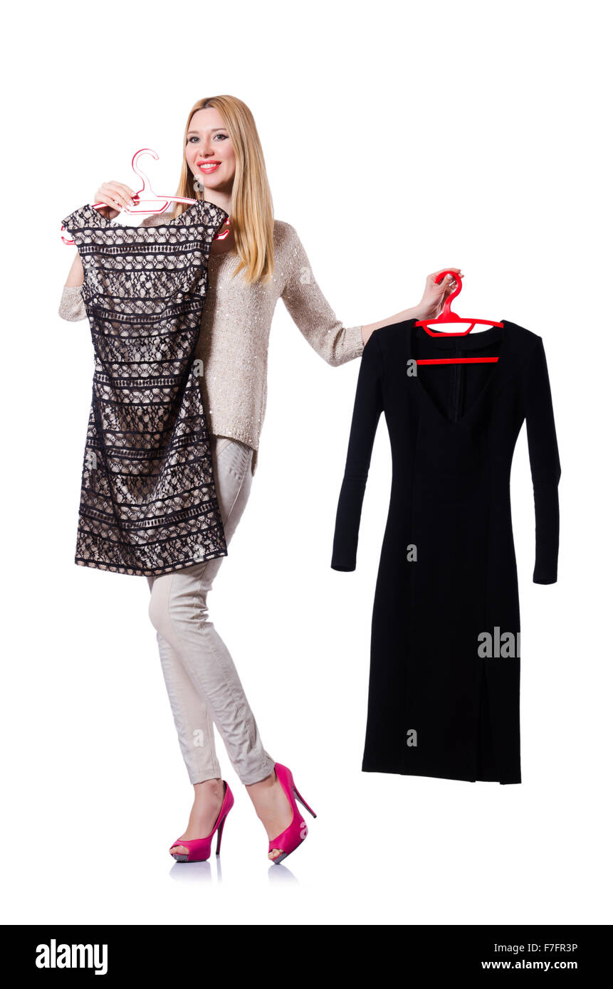Woman trying to choose dress on white Stock Photo - Alamy