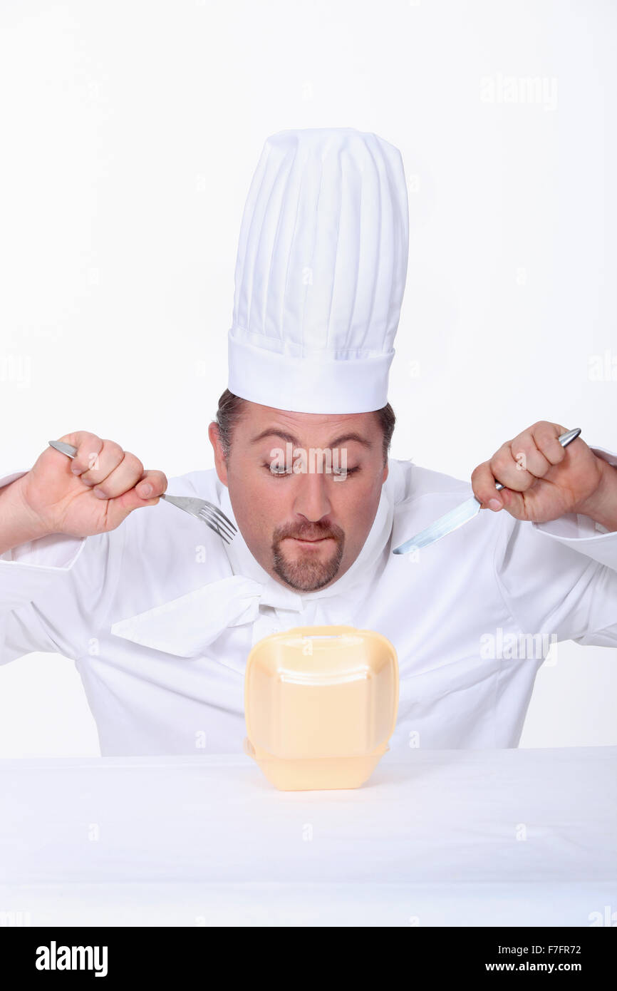 Chef with fast-food box Stock Photo - Alamy