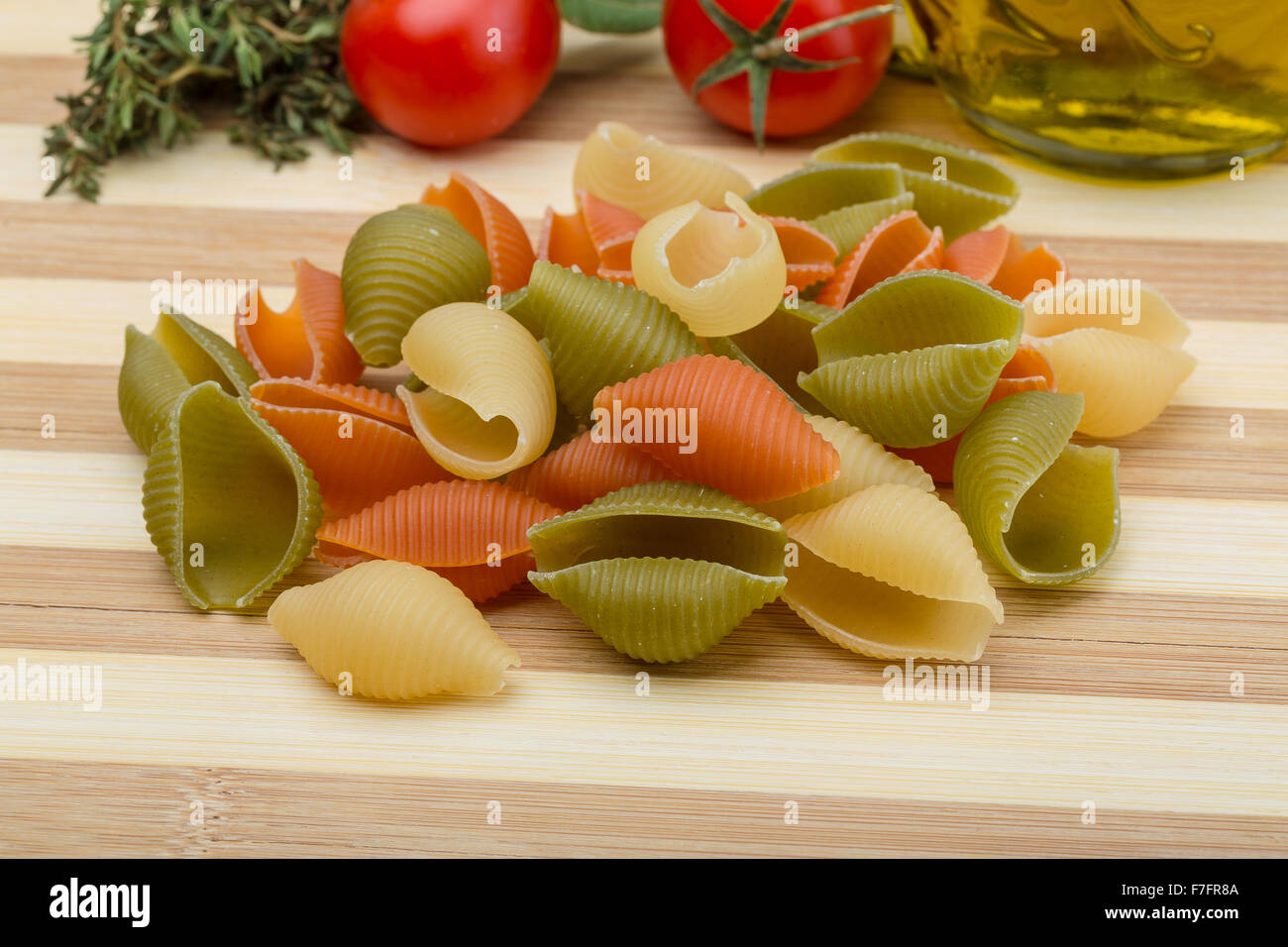 Pipe rigate pasta on the wood background Stock Photo - Alamy