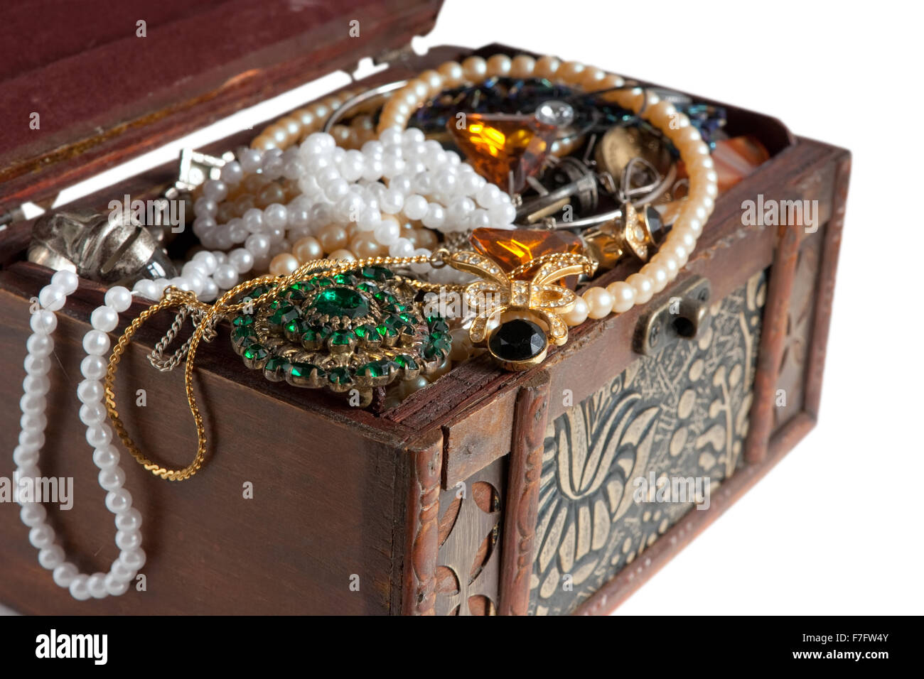 treasure chest with valuables, isolated over white background Stock ...