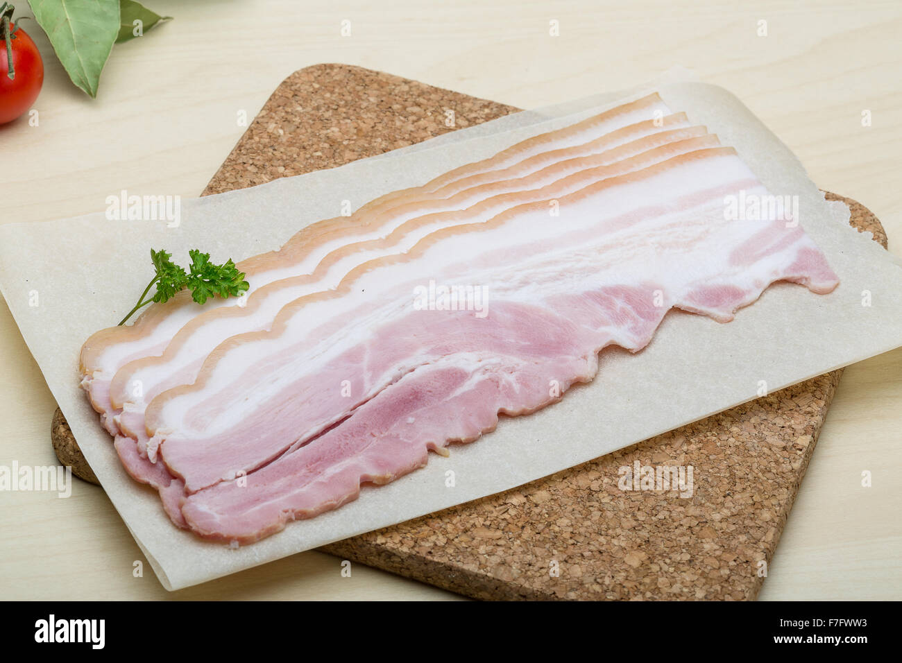 Raw Bacon strips on the wood background Stock Photo - Alamy