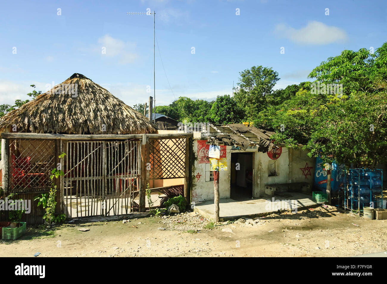 Mayan houses,roofs made with palm trees and weaved hammock, Chichen ...