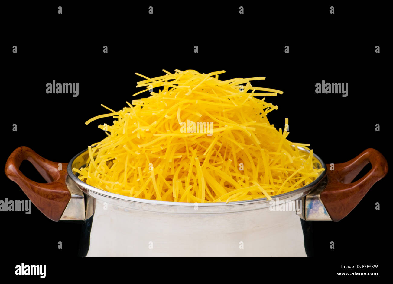 Spaghetti pot isolated on the black background Stock Photo - Alamy