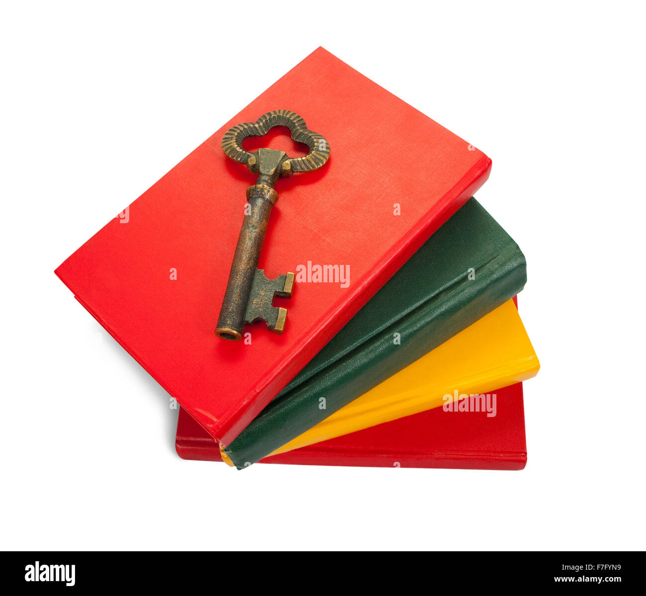 key placed on pile of books, isolated on white with clipping path Stock ...