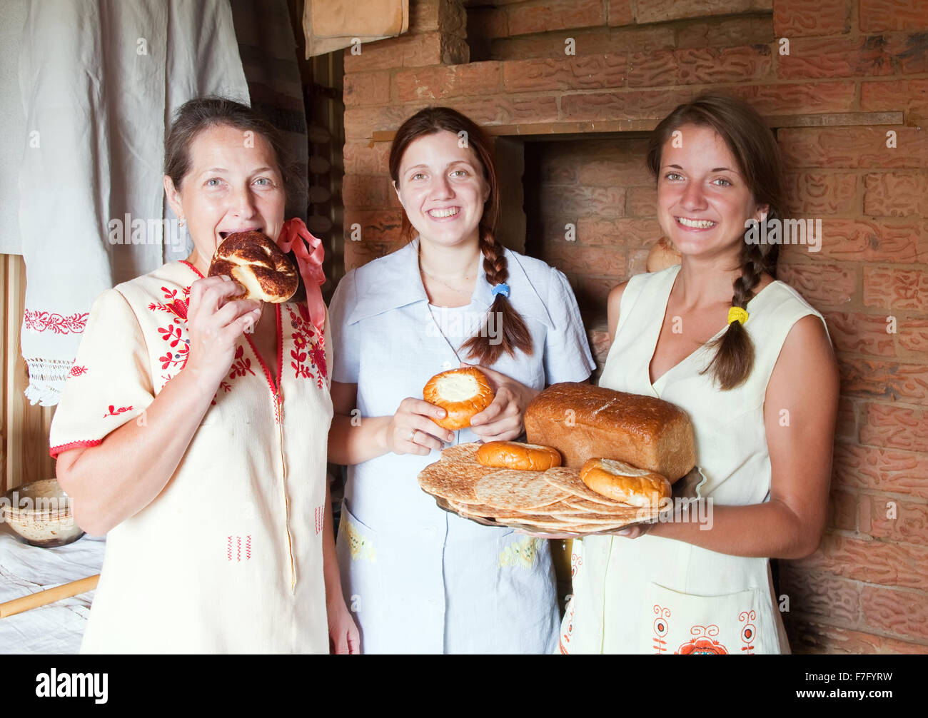 Women with farm-style meal in rural house interior Stock Photo - Alamy