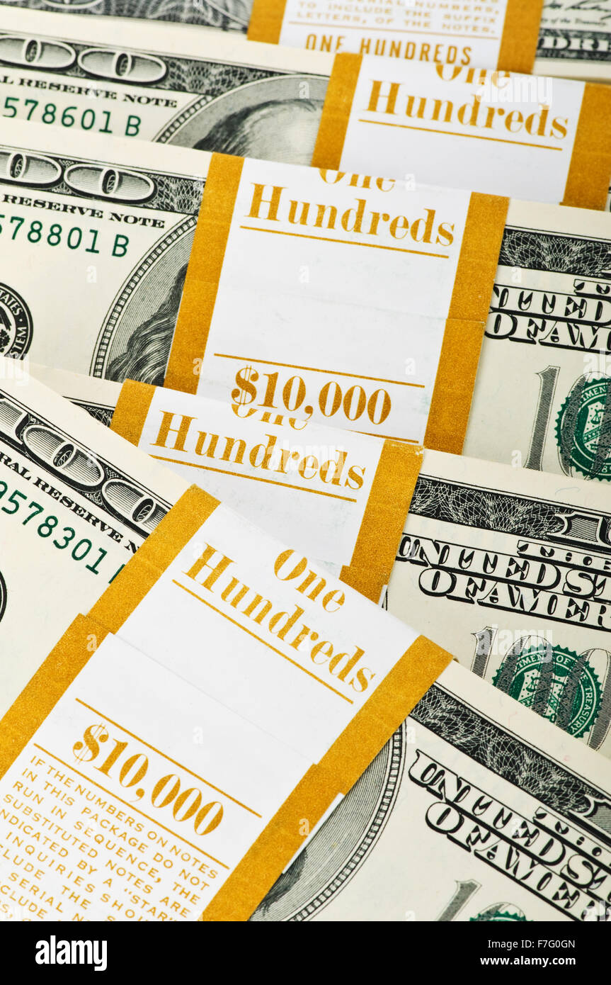 Stack of dollars isolated on the white Stock Photo - Alamy