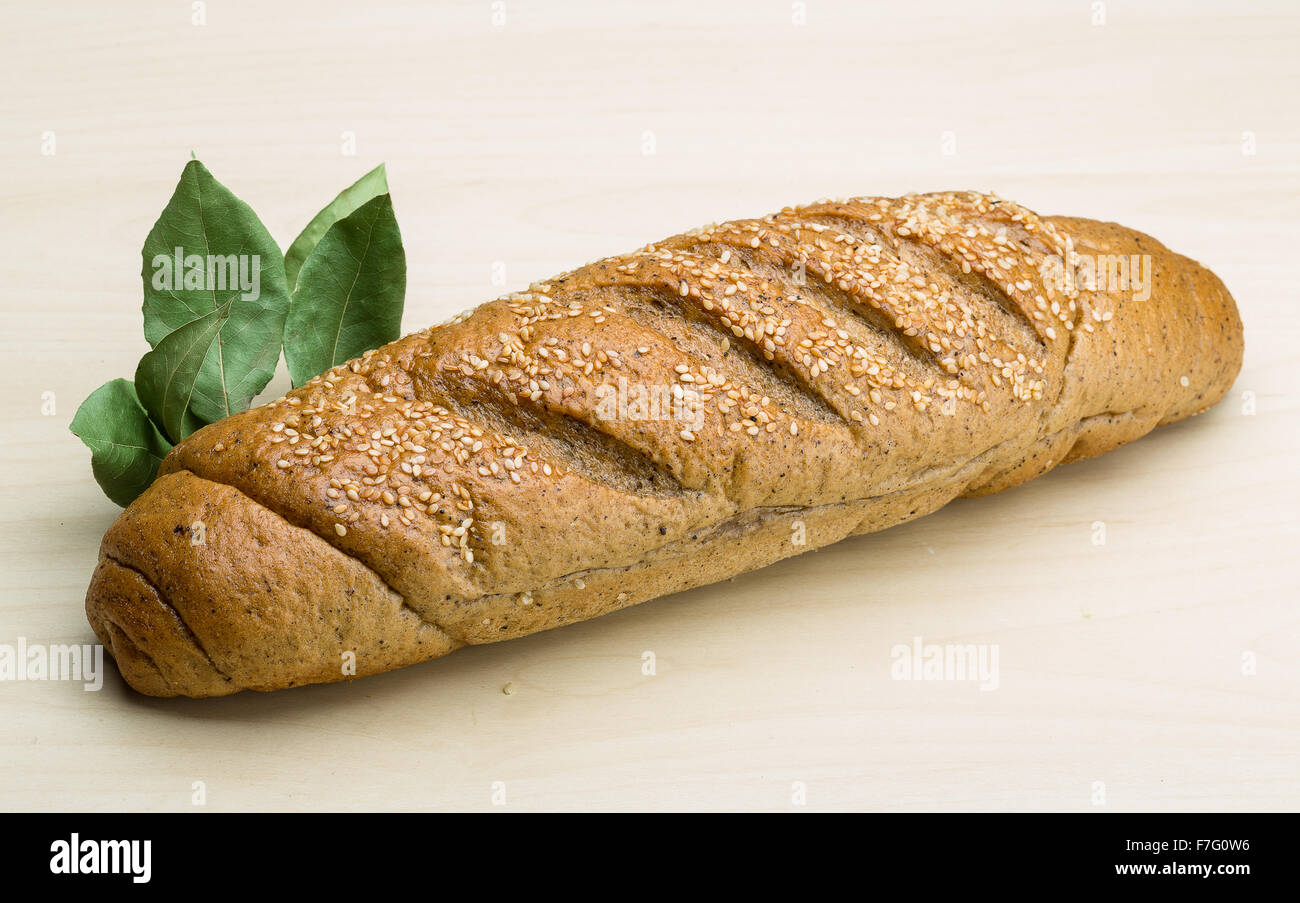 Bread - loaf with seeds and spices leaves Stock Photo - Alamy